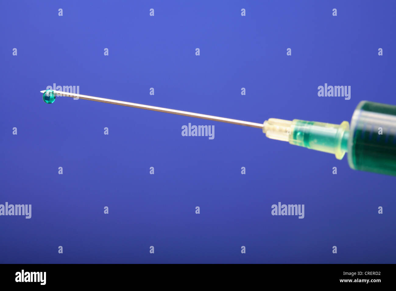hypodermic needle with drop Stock Photo - Alamy