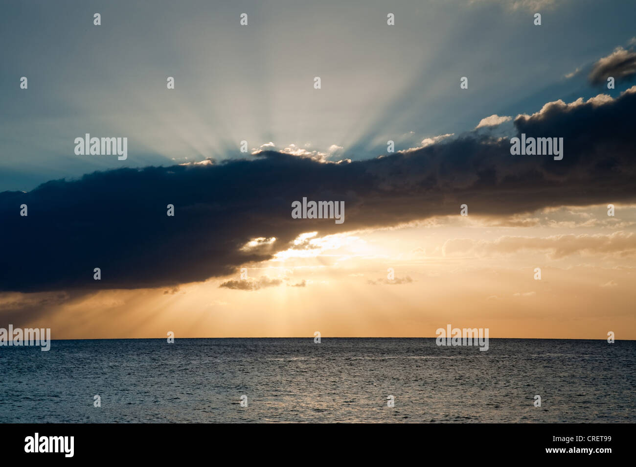 Grand Cayman sunset Stock Photo - Alamy