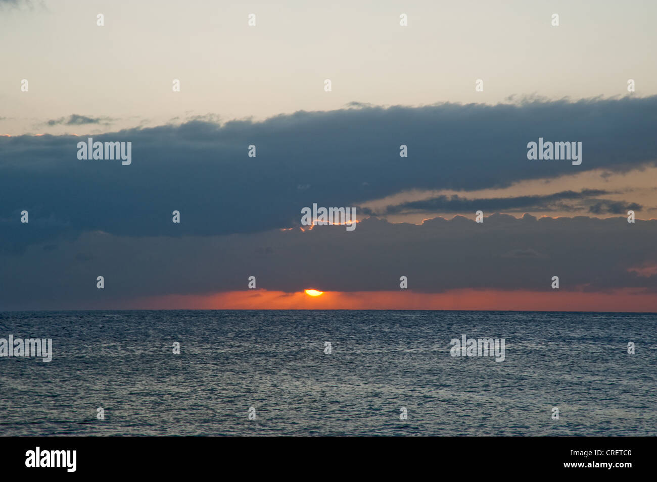 Grand Cayman sunset Stock Photo - Alamy