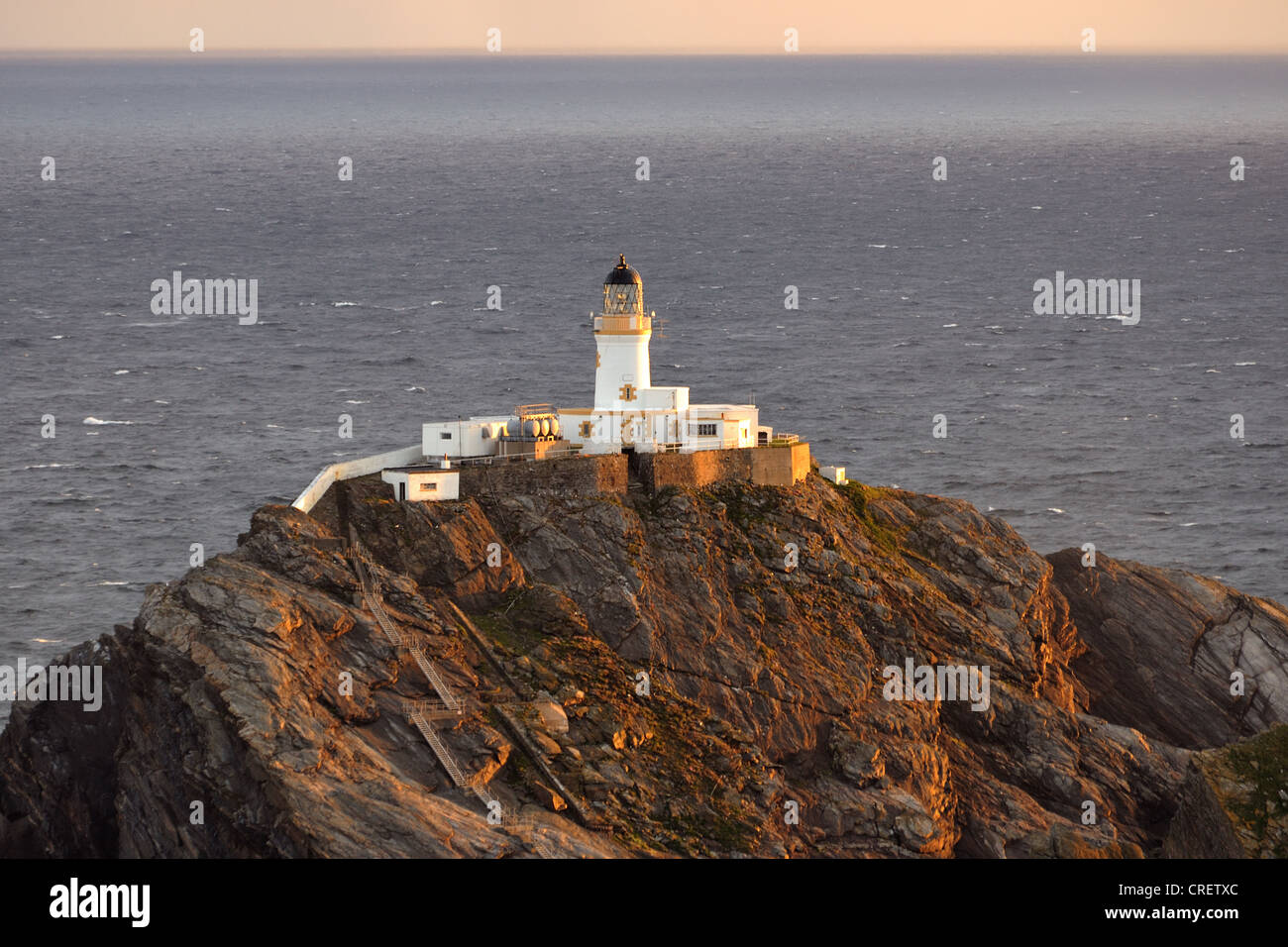 Muckle Flugga Lighthouse at sunrise, Unst, Shetland Stock Photo - Alamy
