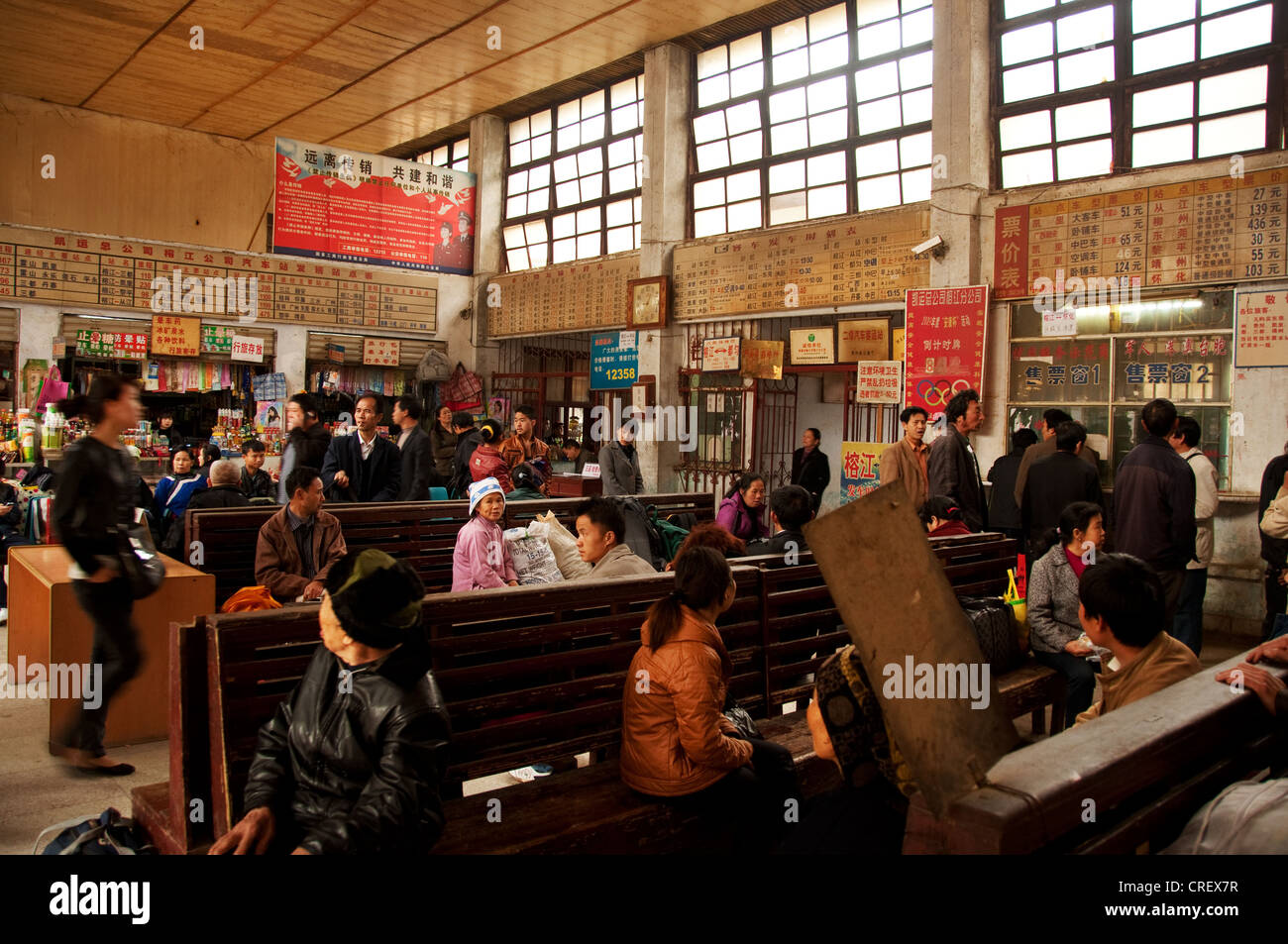 A lot of people in the waiting room of Rongjiang bus station, Southern ...