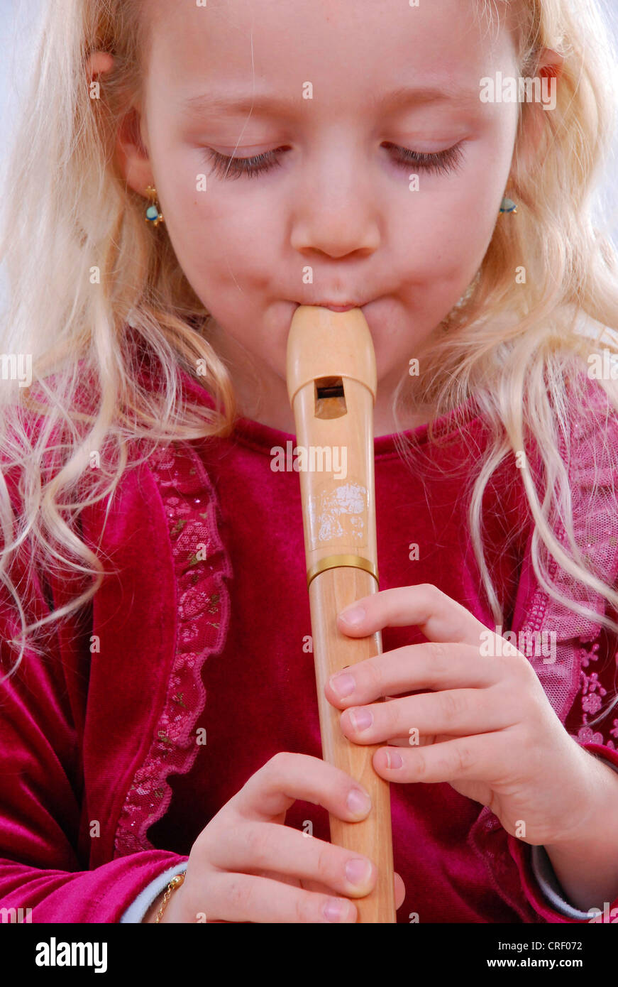 girl playing recorder Stock Photo - Alamy