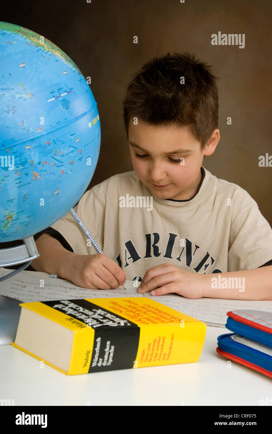 school boy doing homework Stock Photo - Alamy