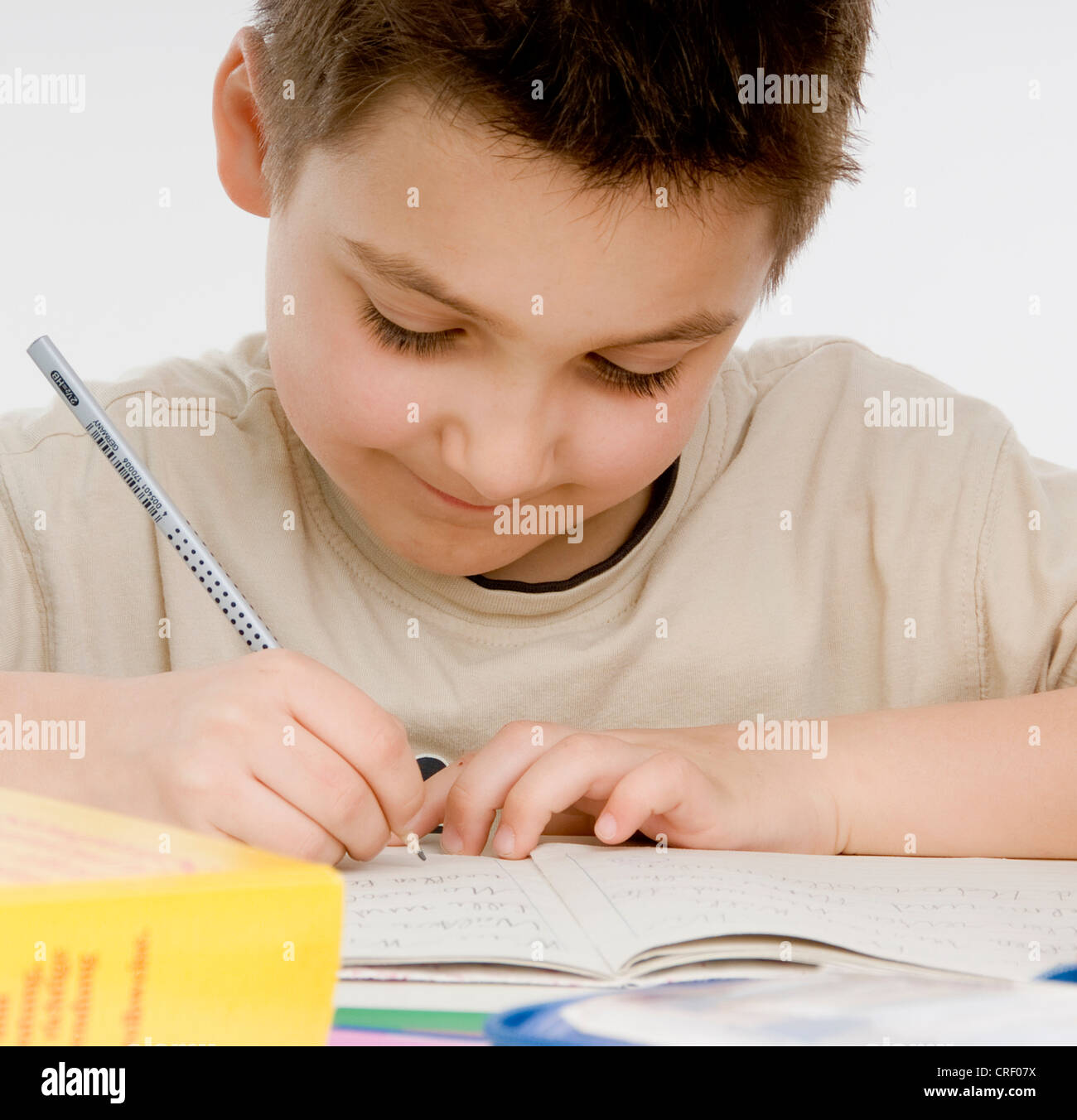 schoolboy doing his homework Stock Photo - Alamy