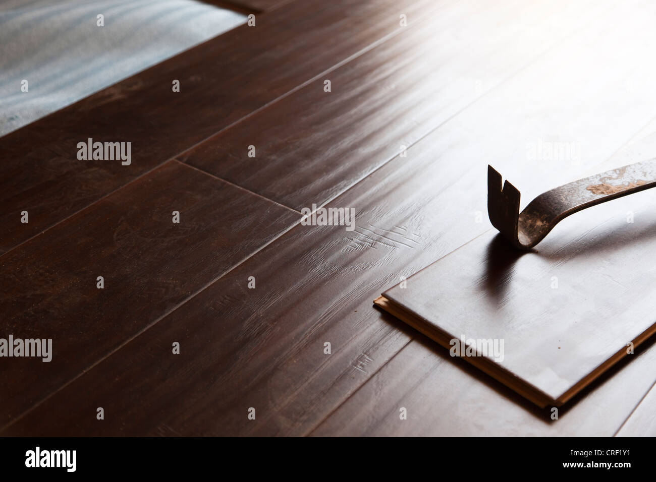 Pry Bar Tool with New Laminate Flooring Abstract Stock Photo - Alamy