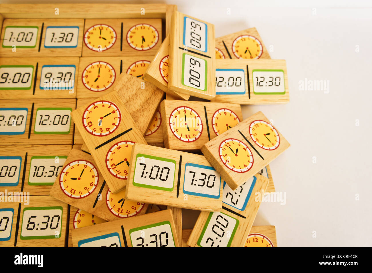 toy clock isolated in white background Stock Photo - Alamy
