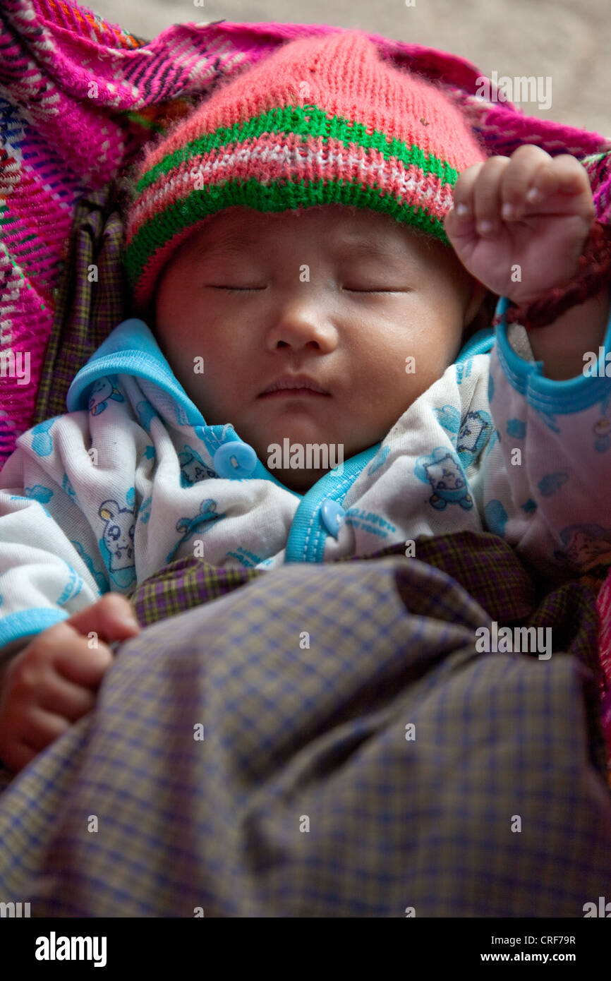 Myanmar, Burma, Yangon. Sleeping Baby Stock Photo - Alamy