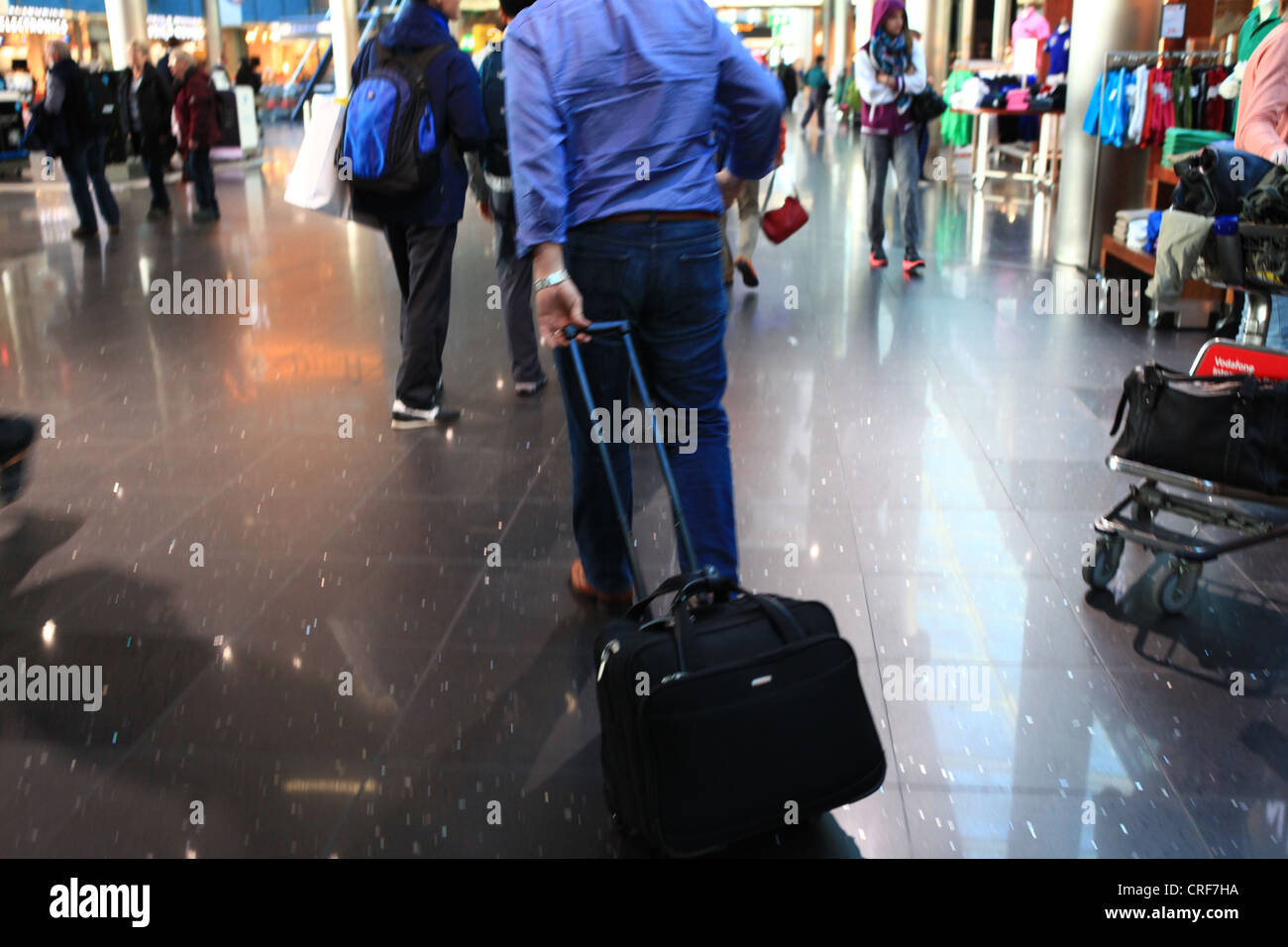 Airport passengers suitcases trolley hi-res stock photography and ...