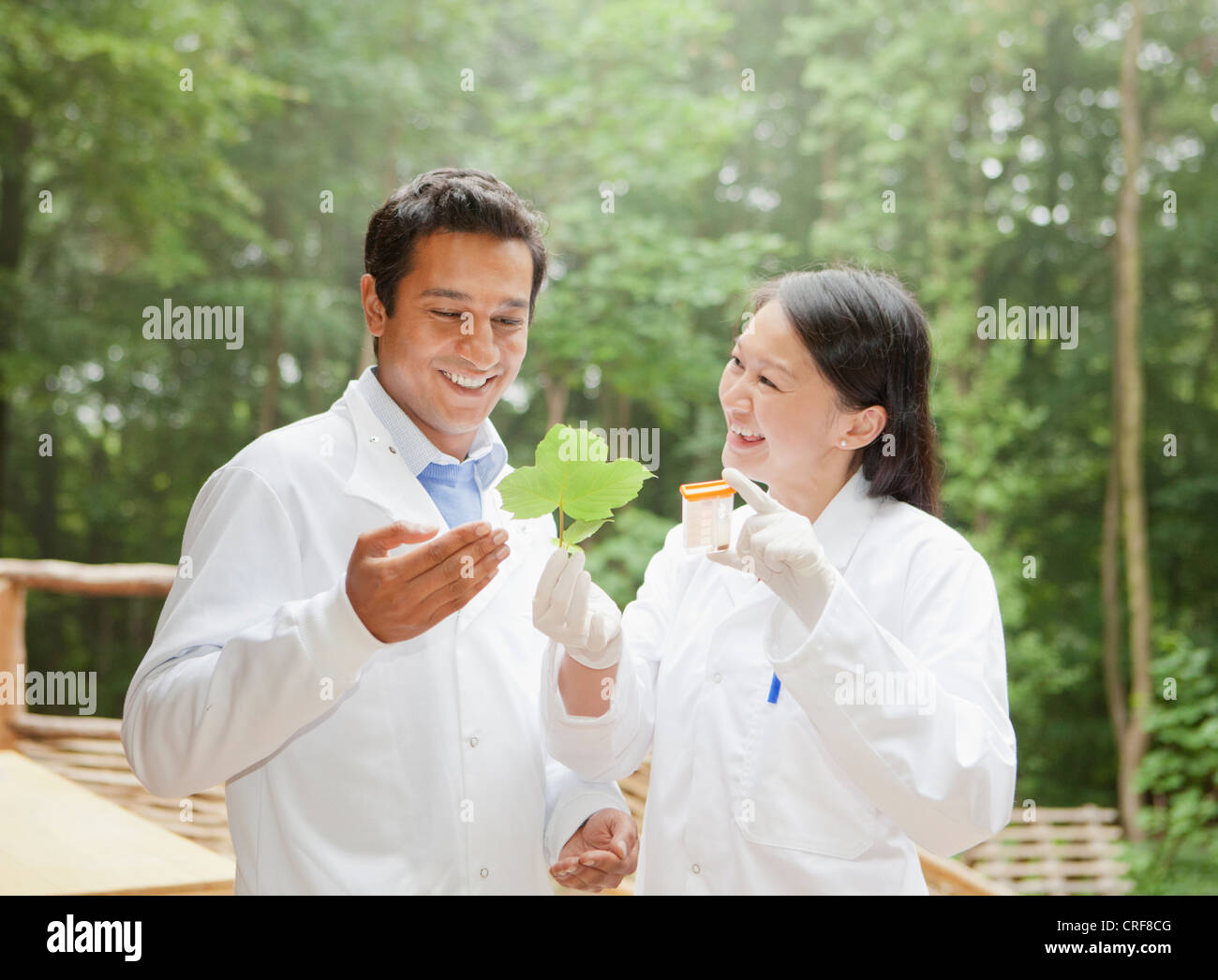 Two happy scientists in hi-res stock photography and images - Alamy