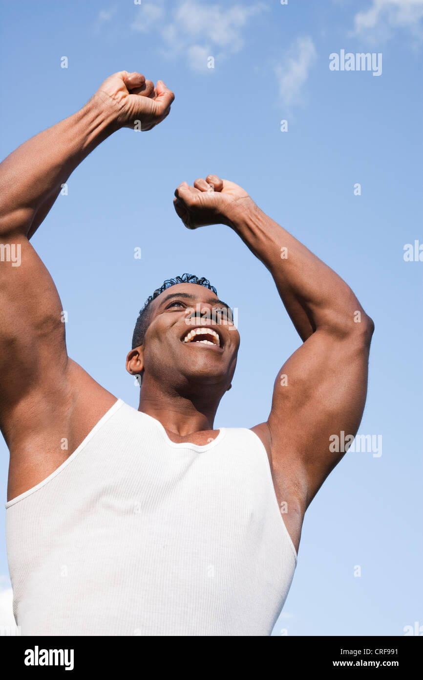 Cheerful African American bodybuilder celebrating success Stock Photo ...