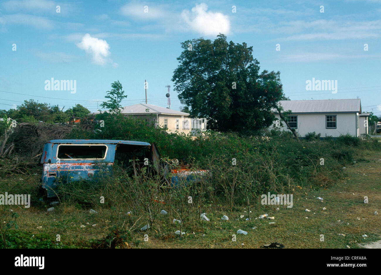 Codrington Barbuda Shanty Town Area Old Car And Rubbish Stock Photo - Alamy
