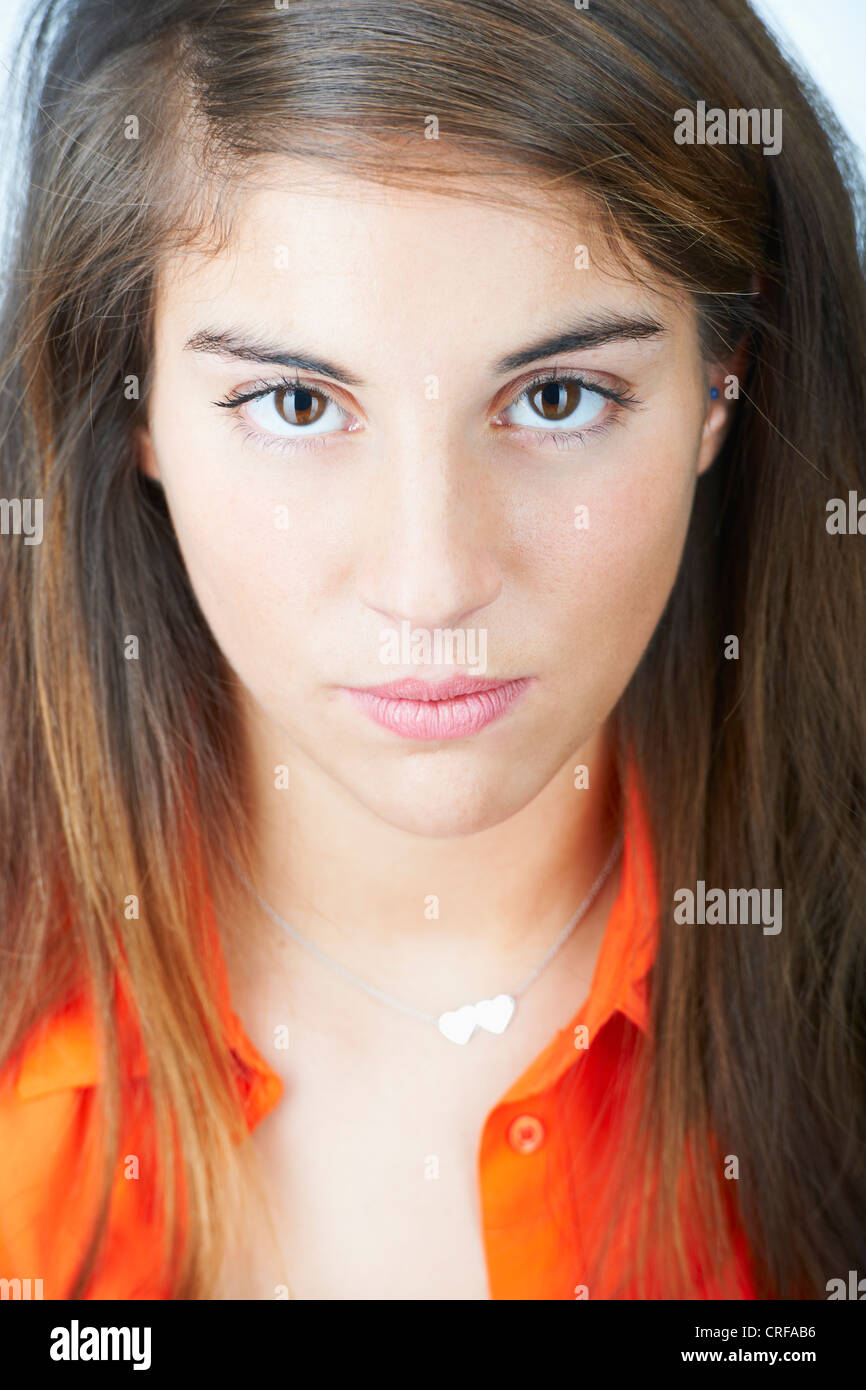 Close up of womans serious face Stock Photo - Alamy