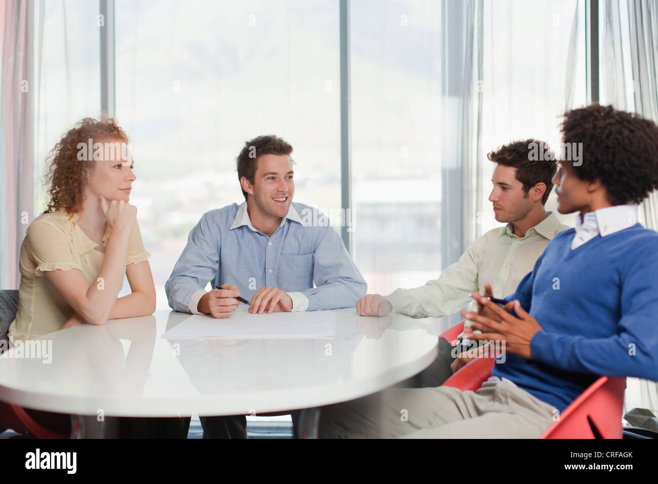 Business people talking in meeting Stock Photo - Alamy