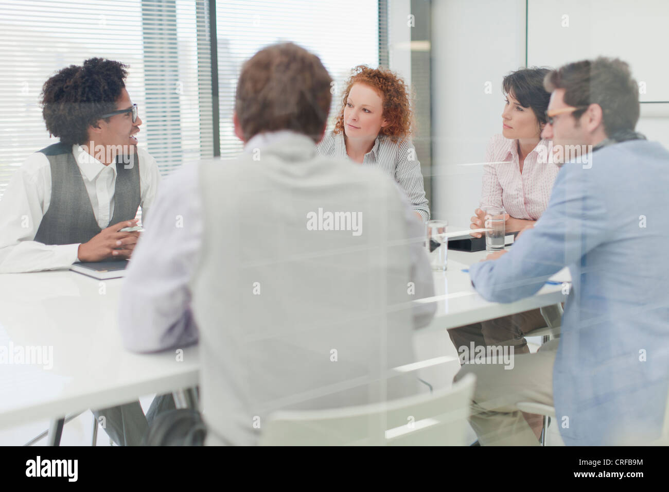 Business people talking in meeting Stock Photo - Alamy