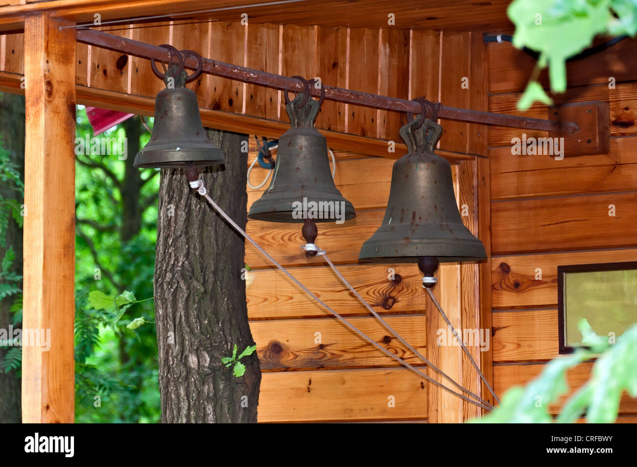 The bells of the old wooden church, close-up Stock Photo - Alamy