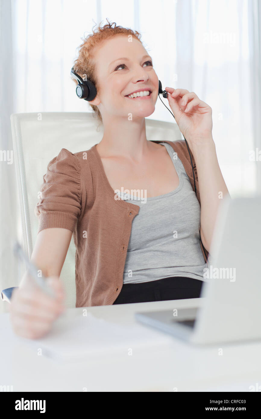 Desk wireless headset phone hi-res stock photography and images - Alamy