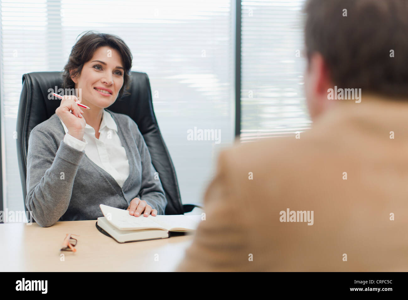 Business people talking in office Stock Photo - Alamy