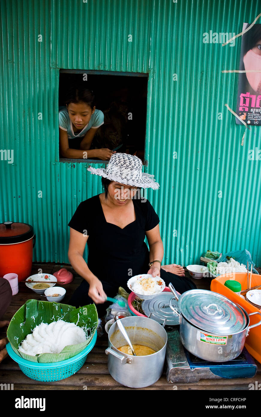 woman cooking in stilt village, Kampot, Cambodia Stock Photo - Alamy