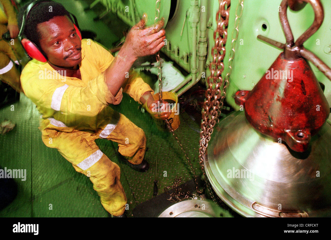 Antwerp, Belgium, ship repair engineer in the engine room Stock Photo ...