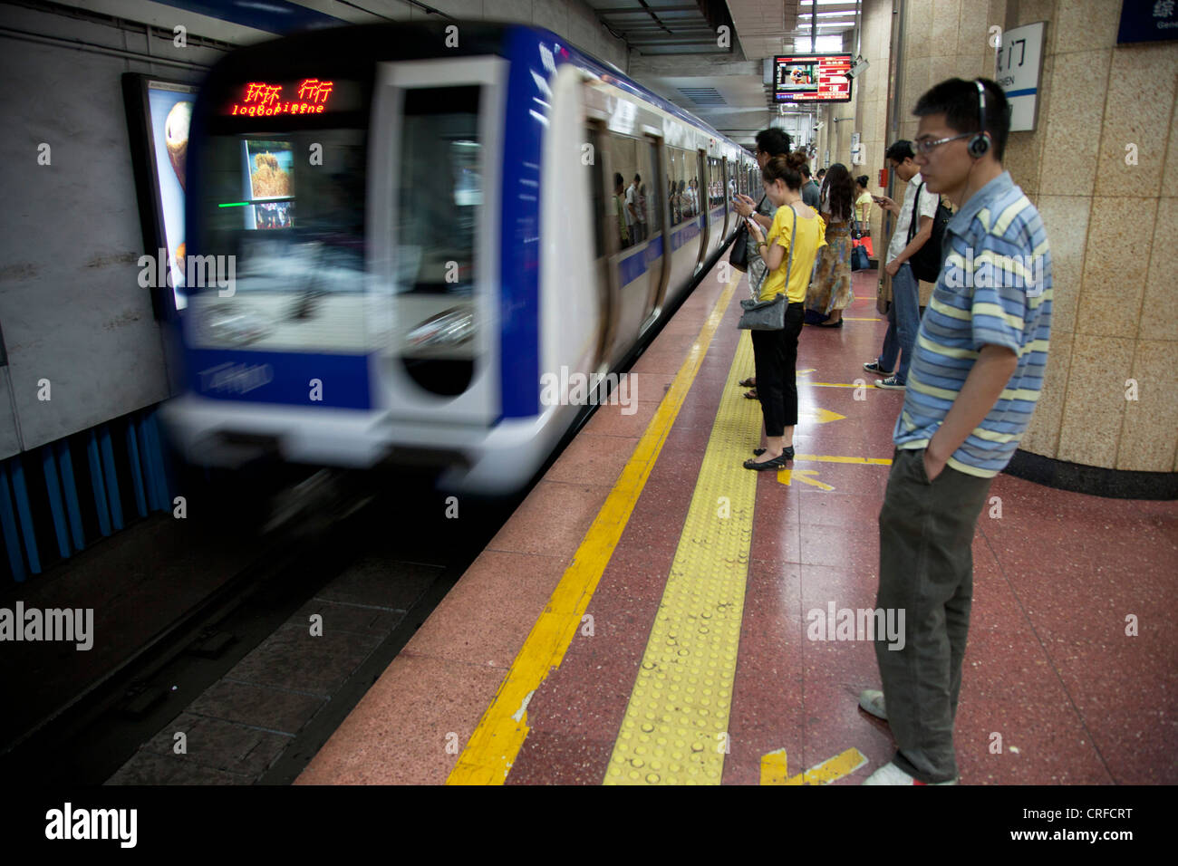 People on the Beijing Metro. The Beijing Subway is a rapid transit rail ...
