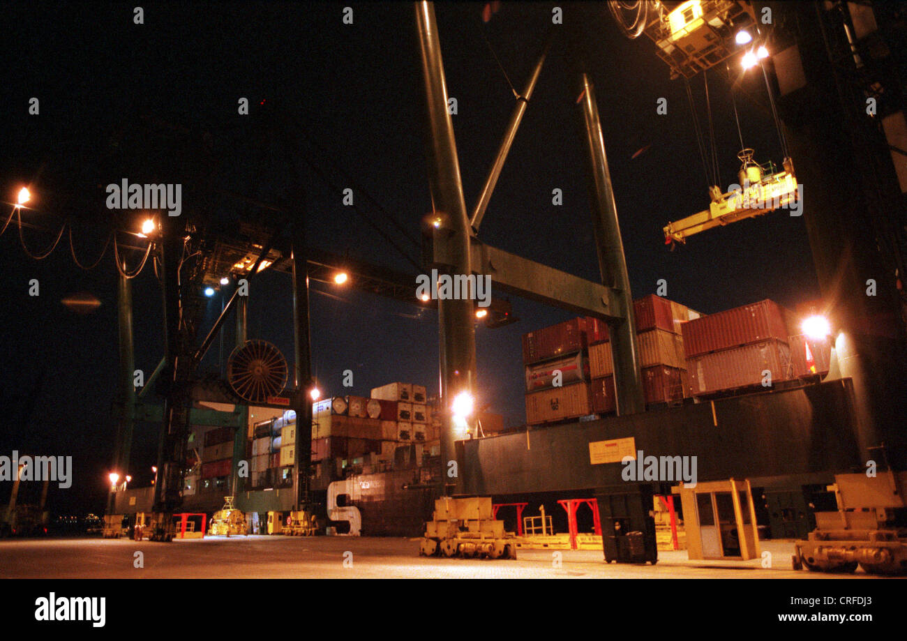 Antwerp, Belgium, the charge of a container ship is deleted Stock Photo ...
