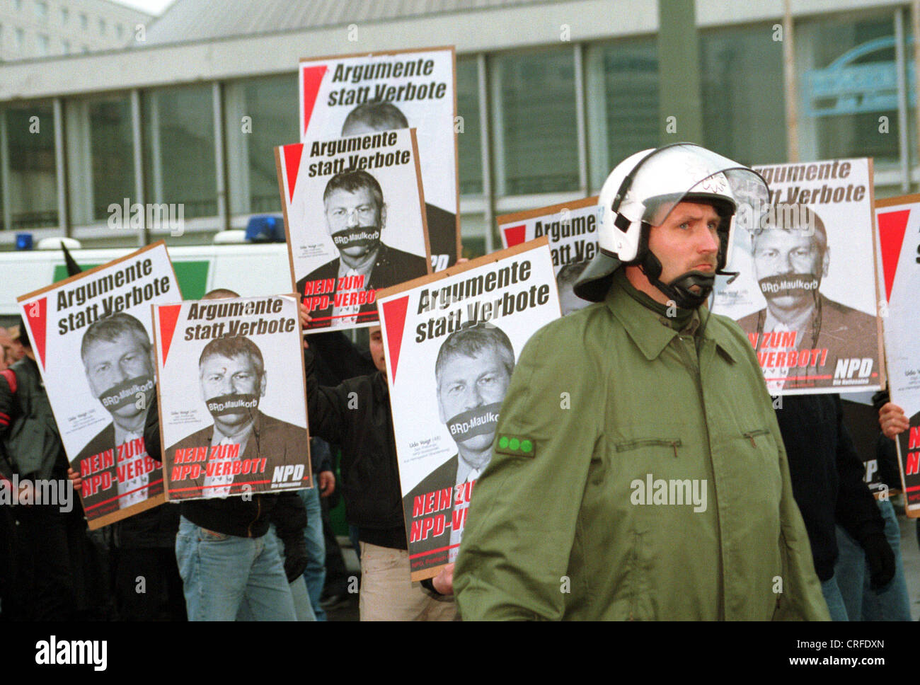 Berlin, Germany, the right party NPD demonstrators and a policeman ...