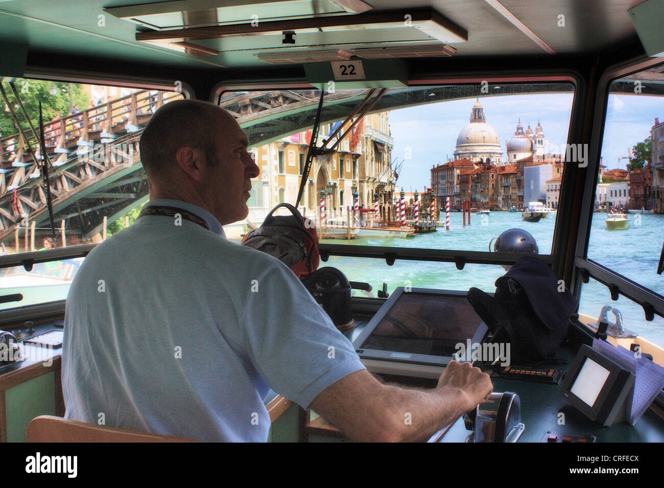 Vaporetto water-bus driver, Venice, Italy Stock Photo - Alamy