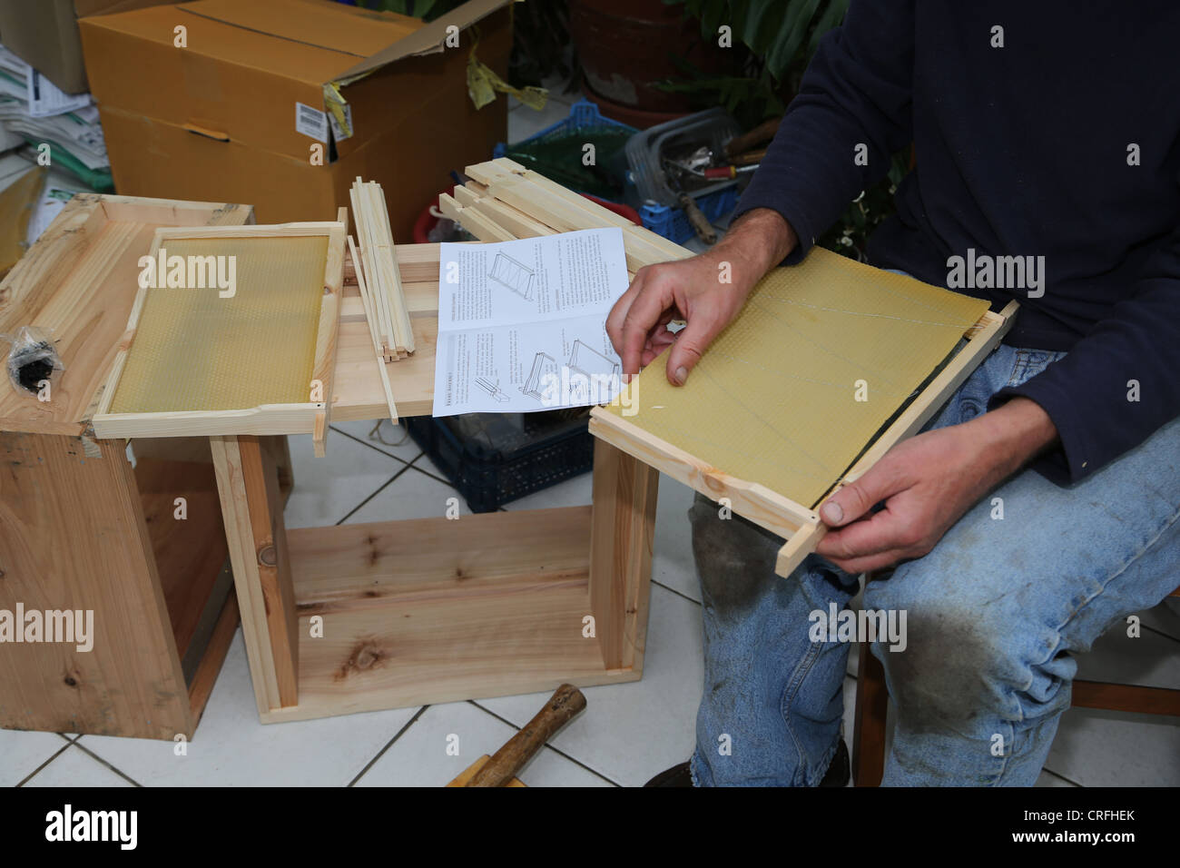 Man Making a Beehive from a Kit Assembling the Frame Stock Photo - Alamy