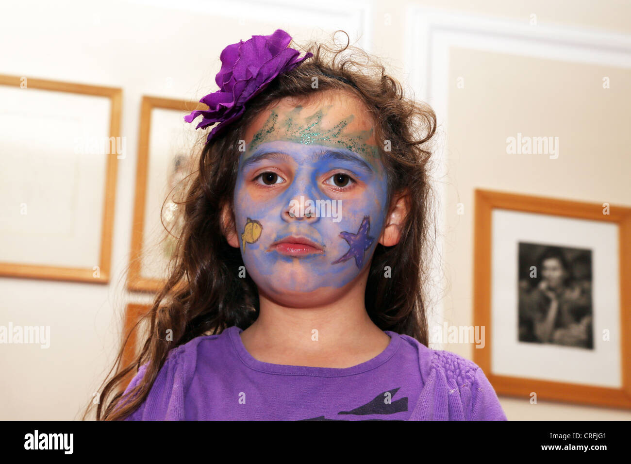 Portrait Of Young Girl With Face Painted As Under The Sea With Starfish ...