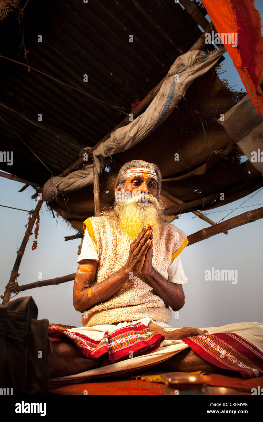 Hindu monk Sadhu show me , how to decorating himself for god, Varanasi ...