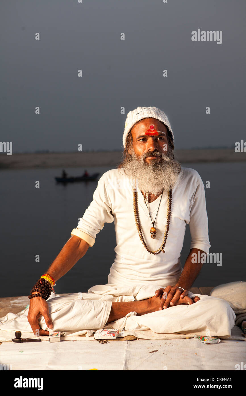 Hindu monk Sadhu(as holy man) sit on the Ghat in Varanasi, Uttar ...