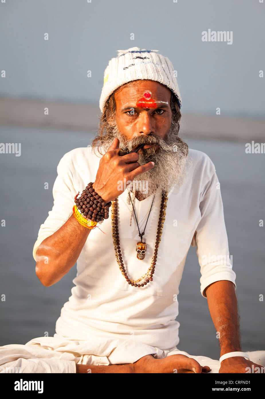 Hindu monk Sadhu(as holy man) sit on the Ghat in Varanasi, Uttar ...