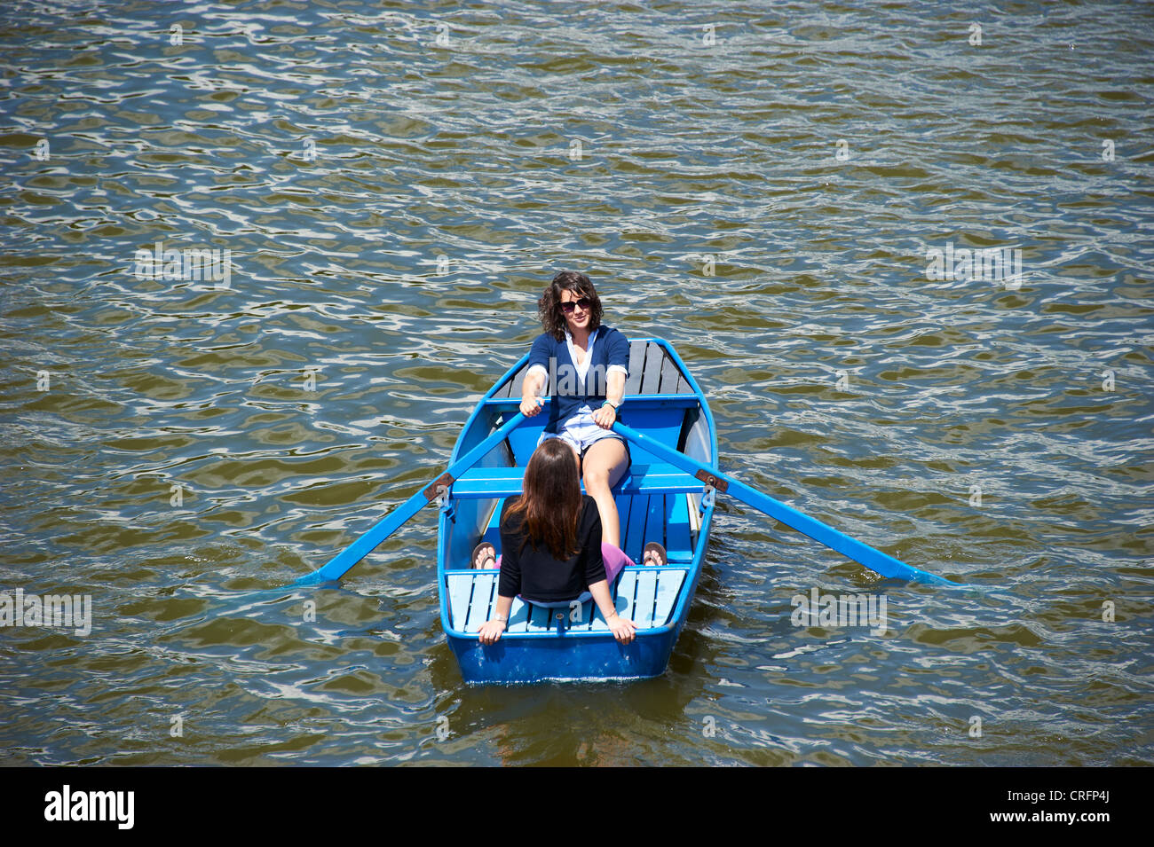 Girl in rowboat hi-res stock photography and images - Alamy