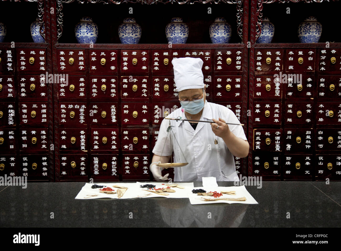 Preparation of traditional Chinese medicine at the Beijing Tongrentang ...