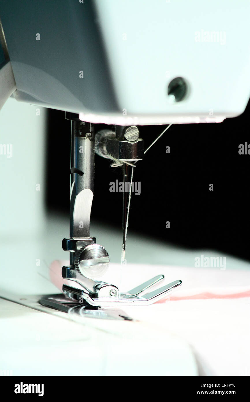 seamstress using sewing machine in their daily work Stock Photo - Alamy