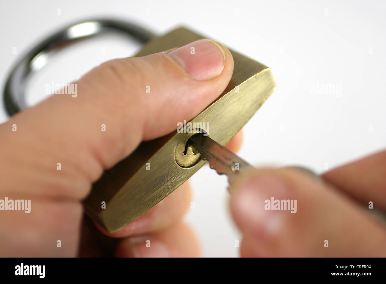 Key in padlock hi-res stock photography and images - Alamy