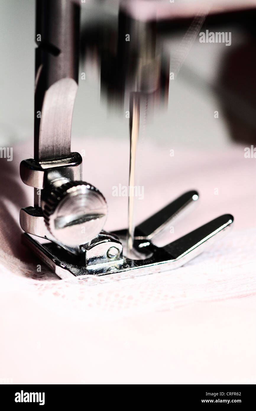 seamstress using sewing machine in their daily work Stock Photo - Alamy