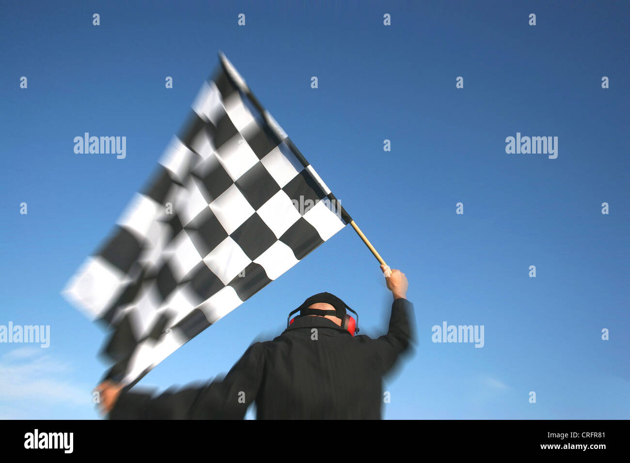 Man waving checkered flag hi-res stock photography and images - Alamy