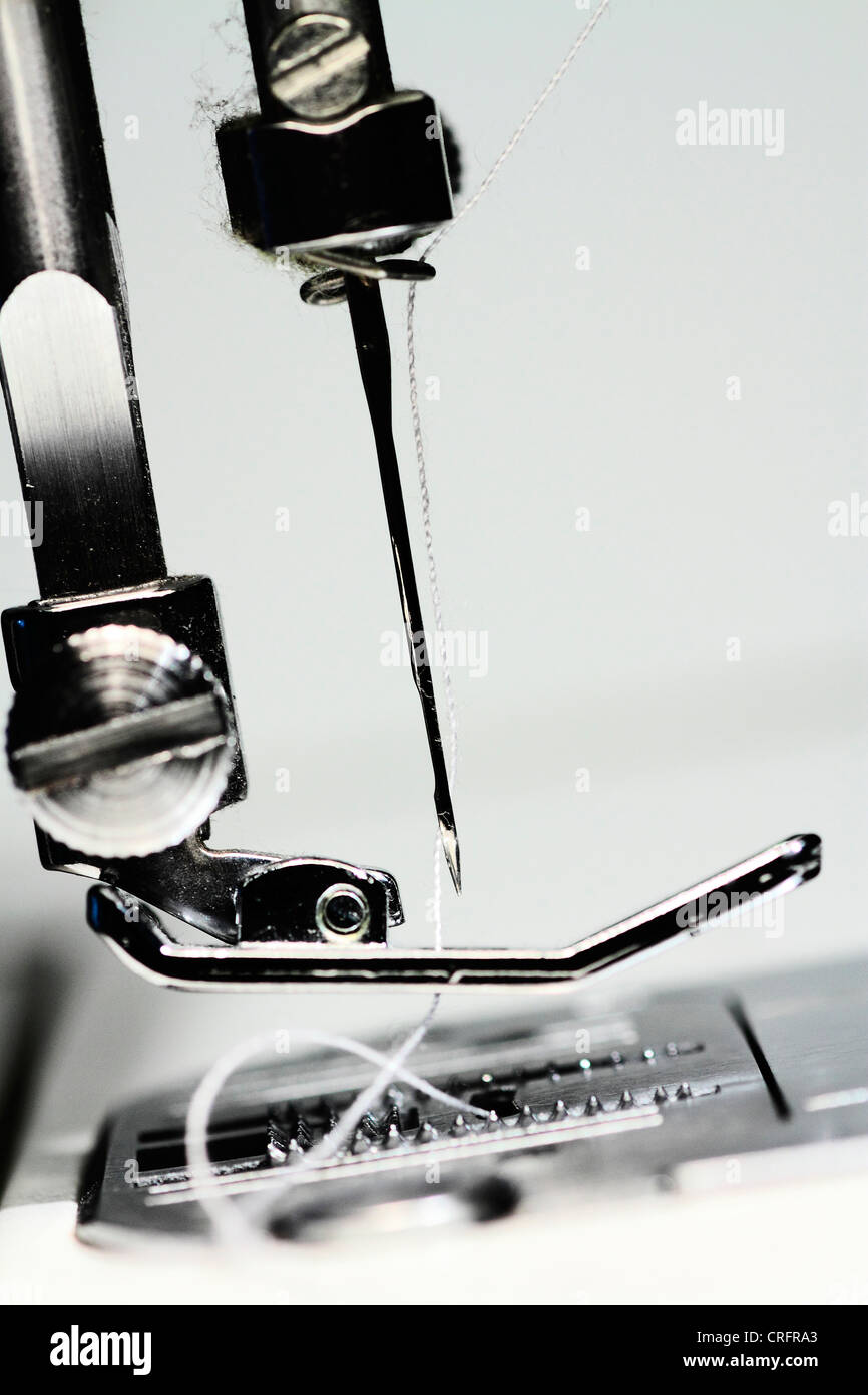 seamstress using sewing machine in their daily work Stock Photo - Alamy