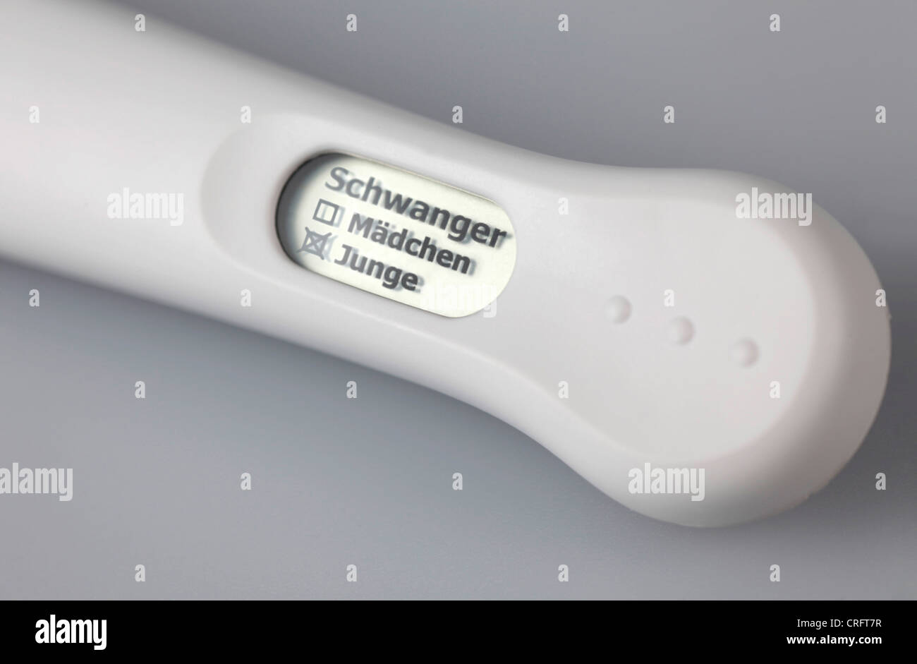 pregnancy test diagnosing pregnancy with a boy Stock Photo - Alamy