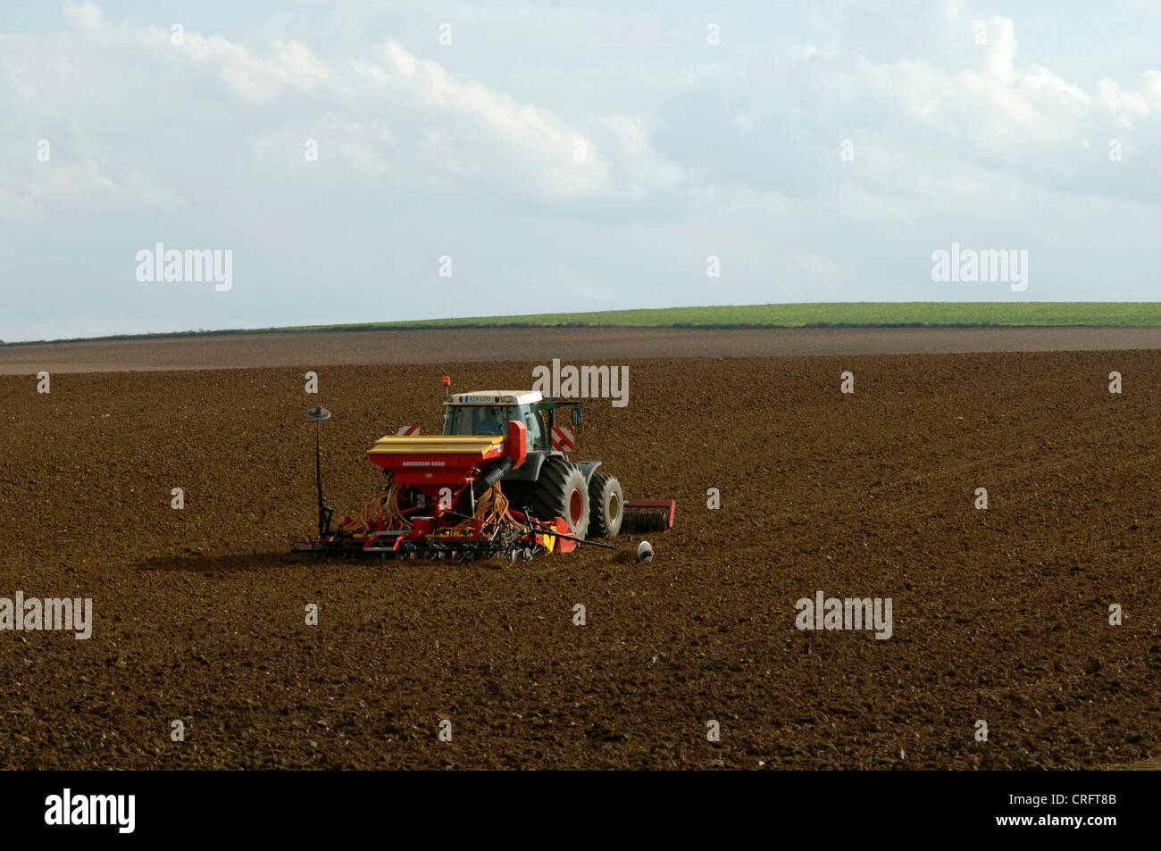 sowing with tractor, tiller and sowing machine, Germany Stock Photo - Alamy
