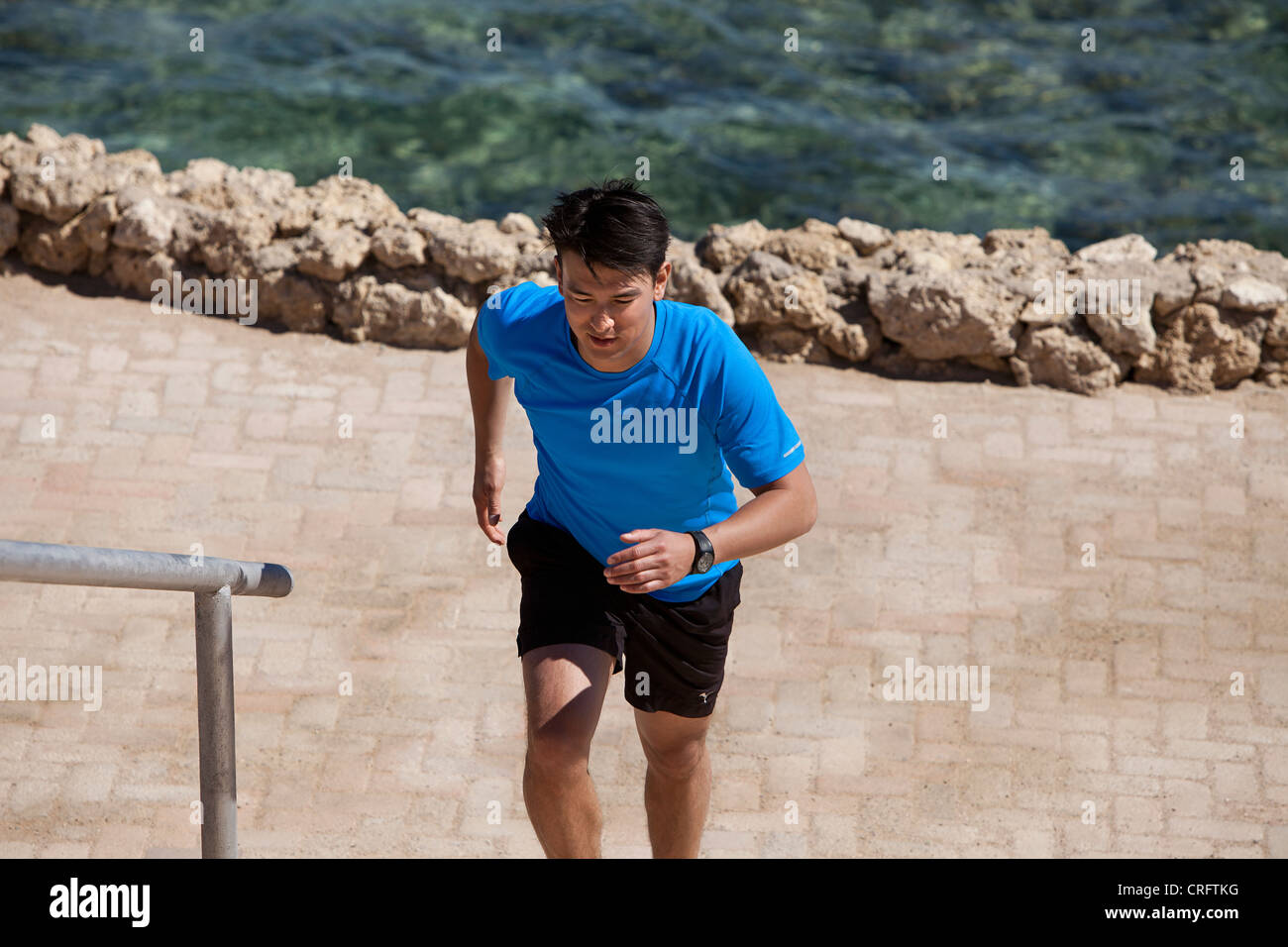 Step running hi-res stock photography and images - Alamy