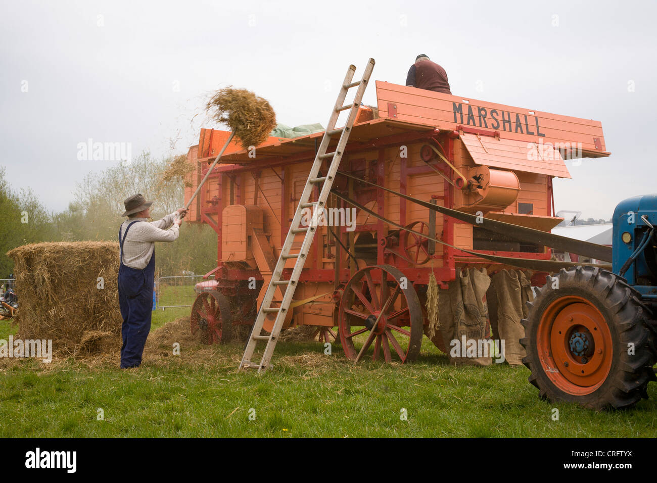 Traditional corn threshing demonstration Stock Photo - Alamy