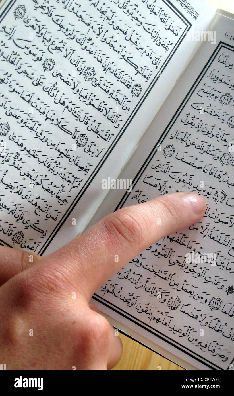 Koran reader hi-res stock photography and images - Alamy