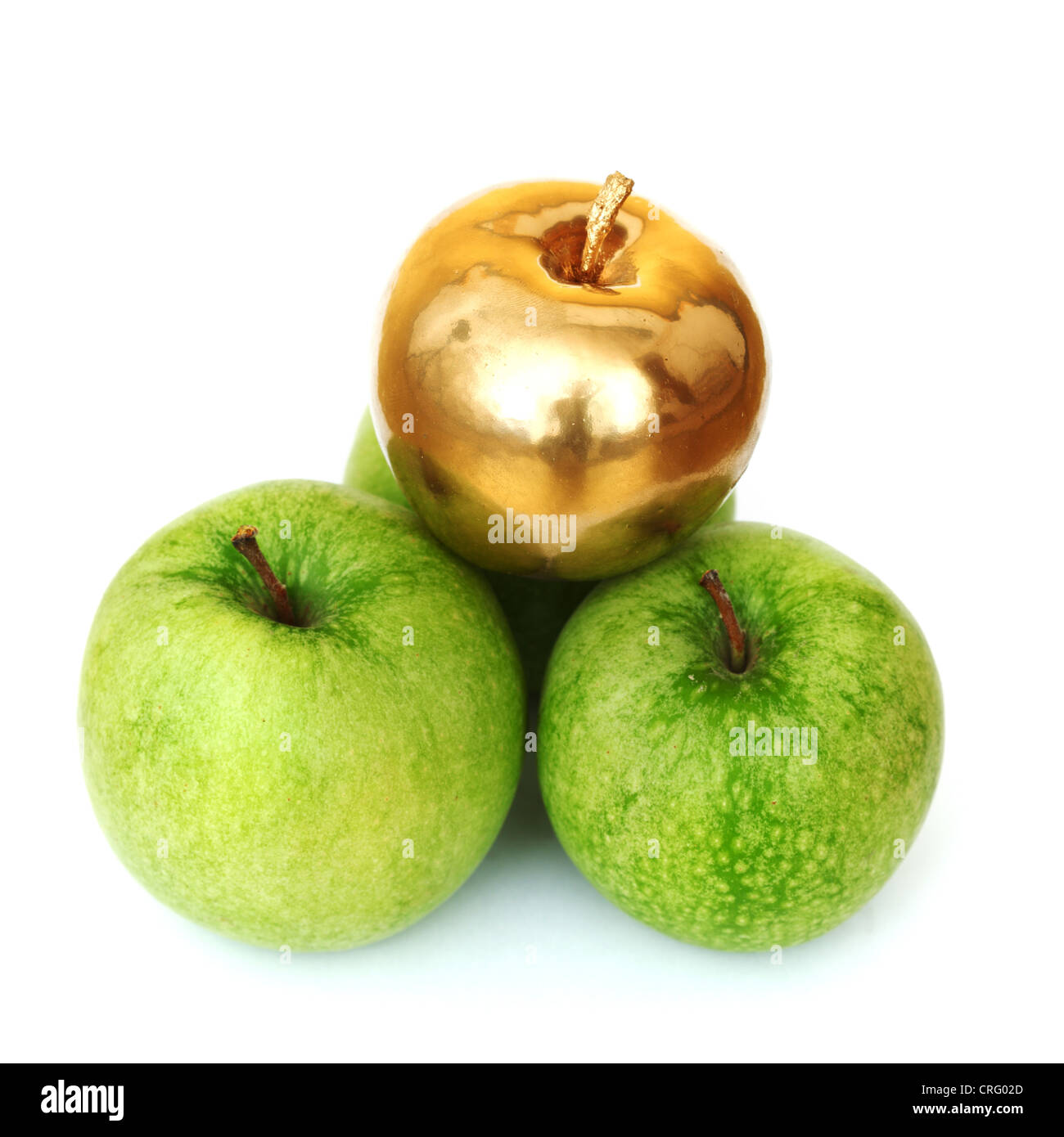 gold and green apples on white background Stock Photo - Alamy