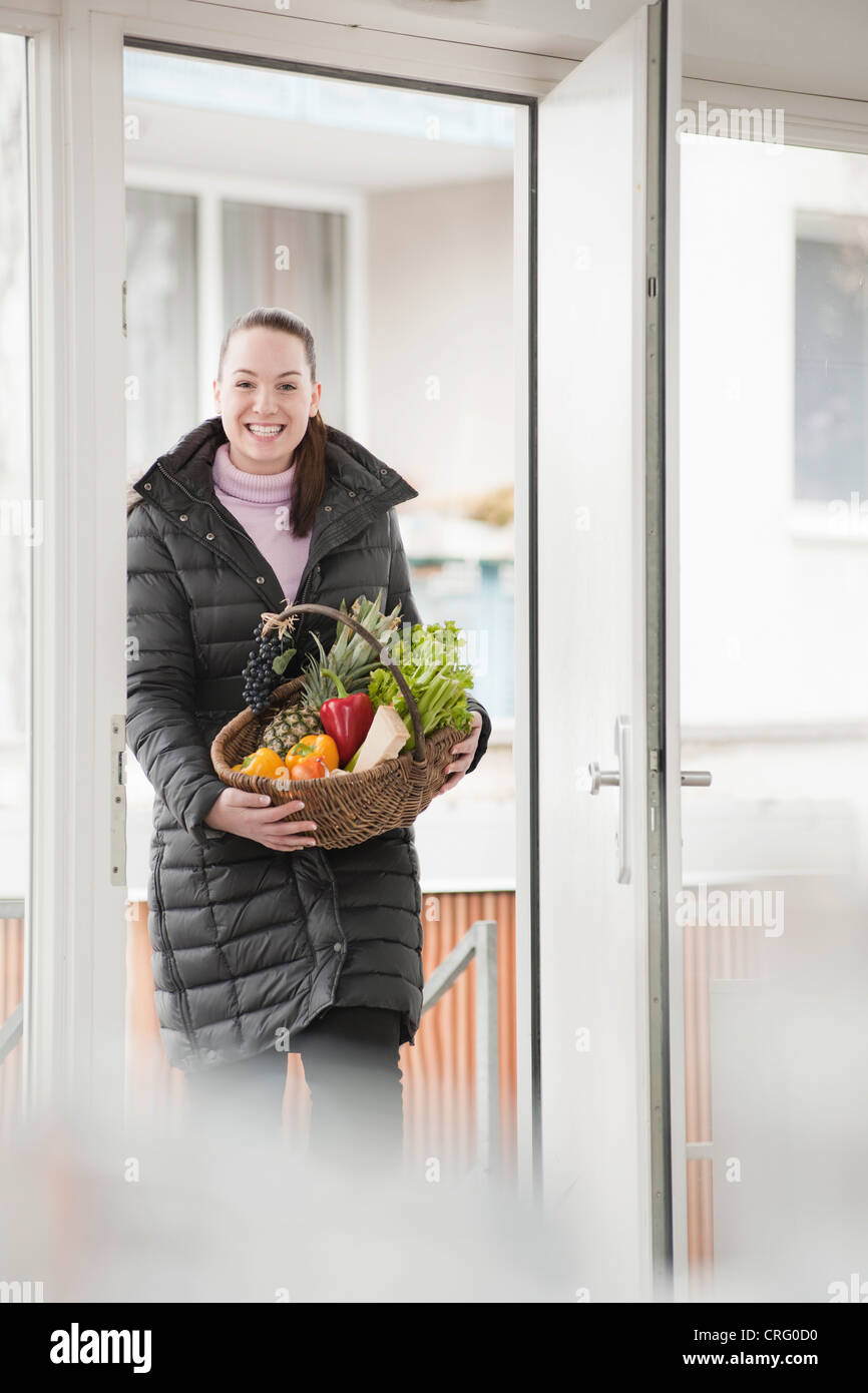 Three women bringing fruit hi-res stock photography and images - Alamy
