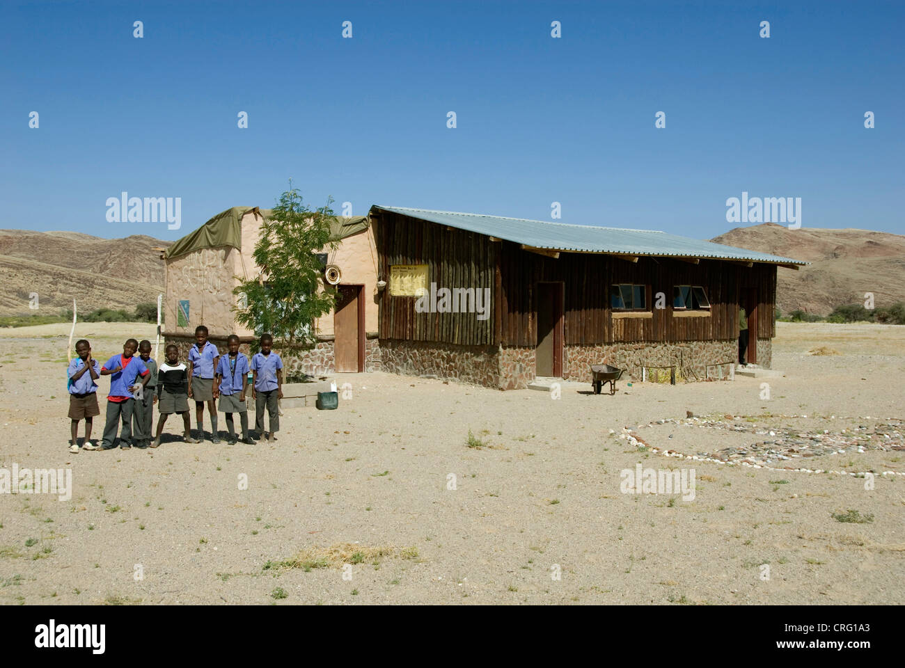 group of school childs in front of the school building, Namibia, Purros ...