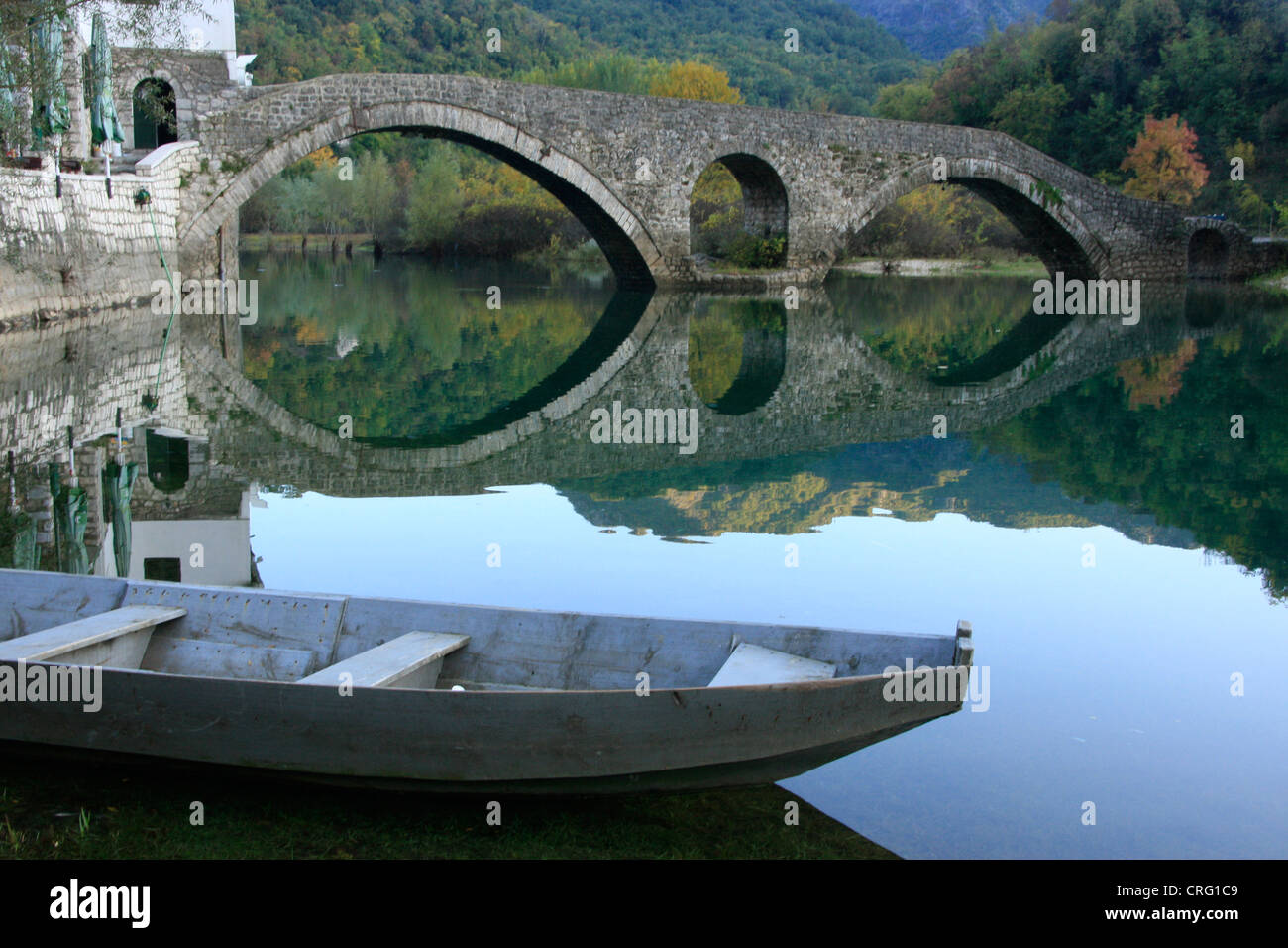 Old boat and stone bridge, Rijeka Crnojevica, Cetinje, Montenegro Stock Photo - Alamy