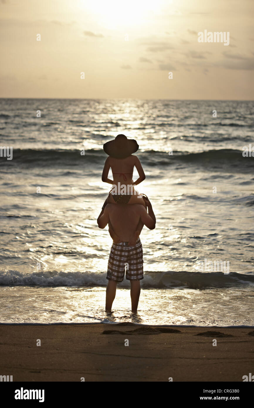 Man carrying girlfriend on shoulders Stock Photo - Alamy