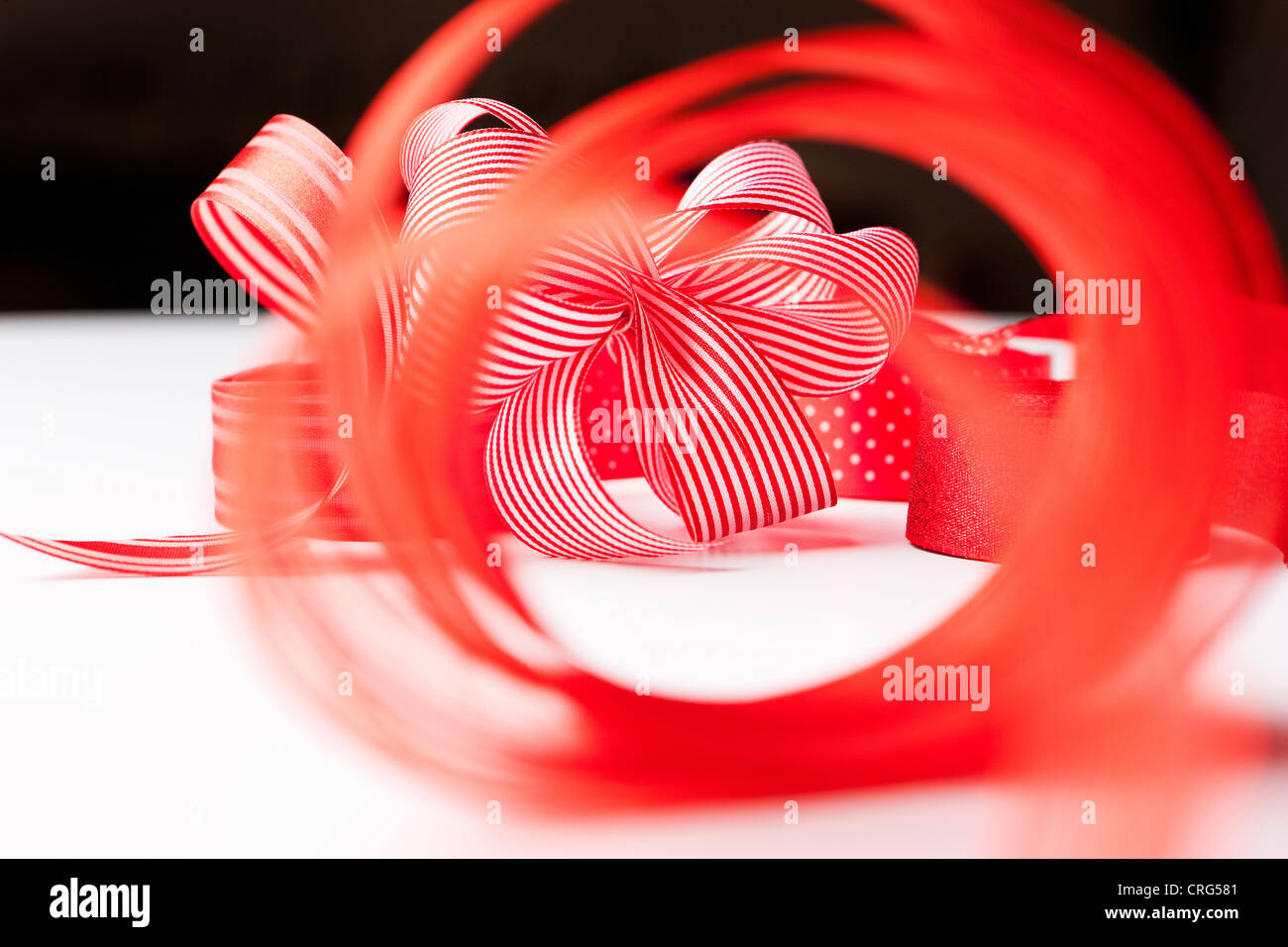 Close up of decorative red ribbons Stock Photo - Alamy